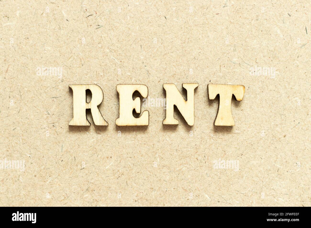 Alphabet letter in word rent on wood background Stock Photo - Alamy