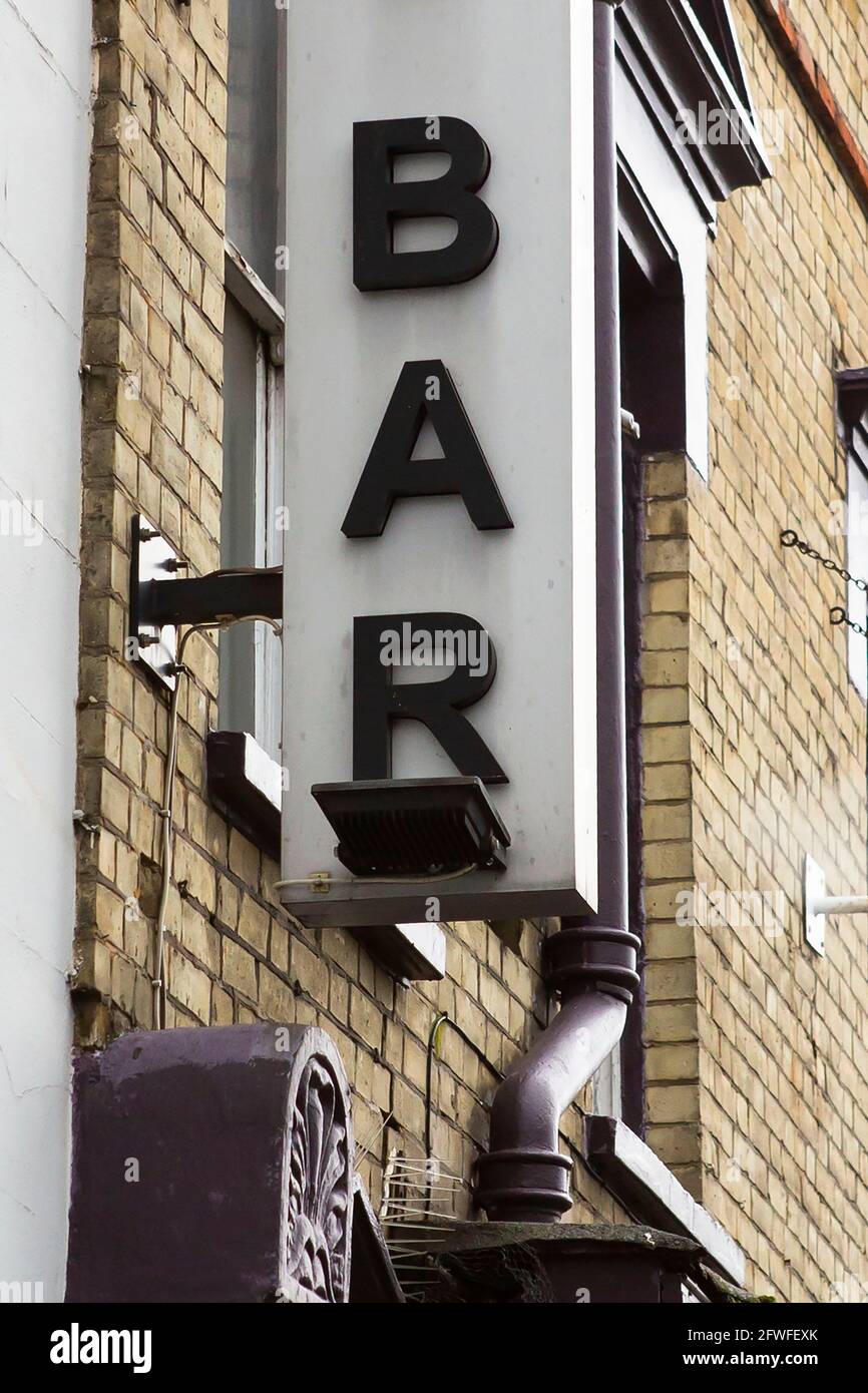 Bar sign in urban area Stock Photo - Alamy