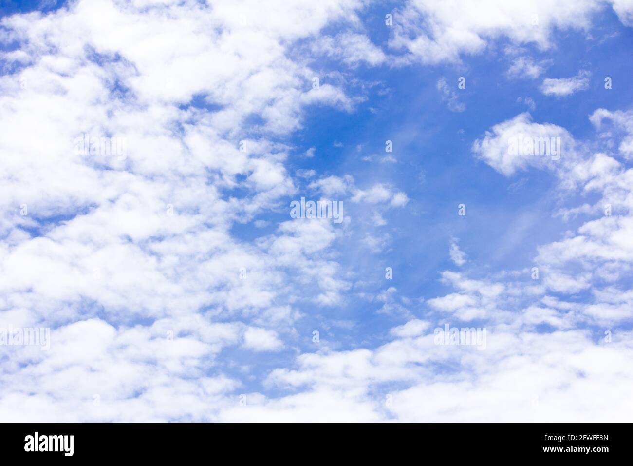 Clear blue color sky with white cloud background Stock Photo - Alamy
