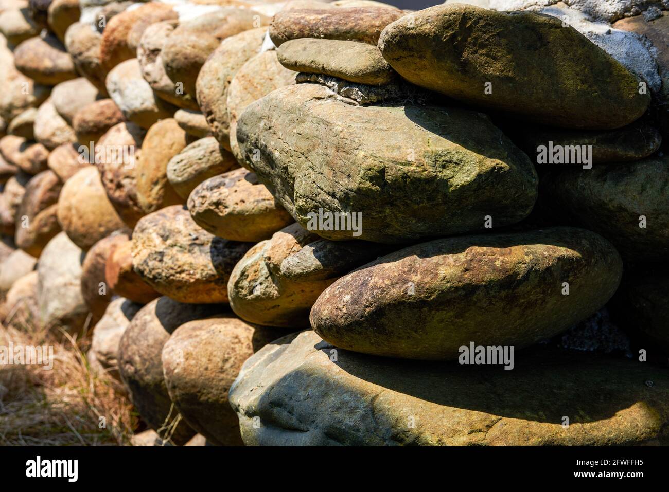 Large stone road and stone wall in the countryside Stock Photo - Alamy