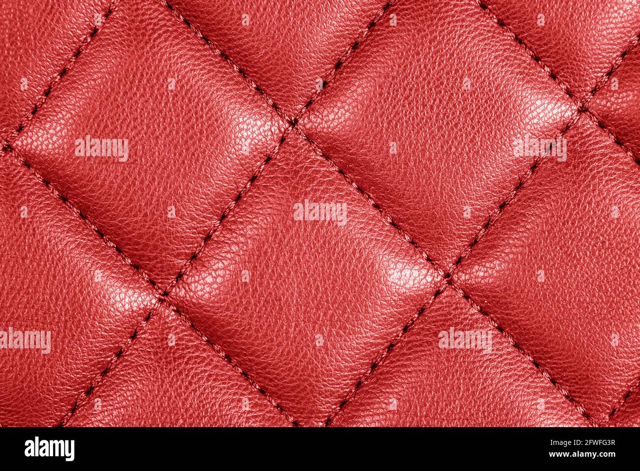 Modern luxury car red leather interior. Part of perforated leather car ...