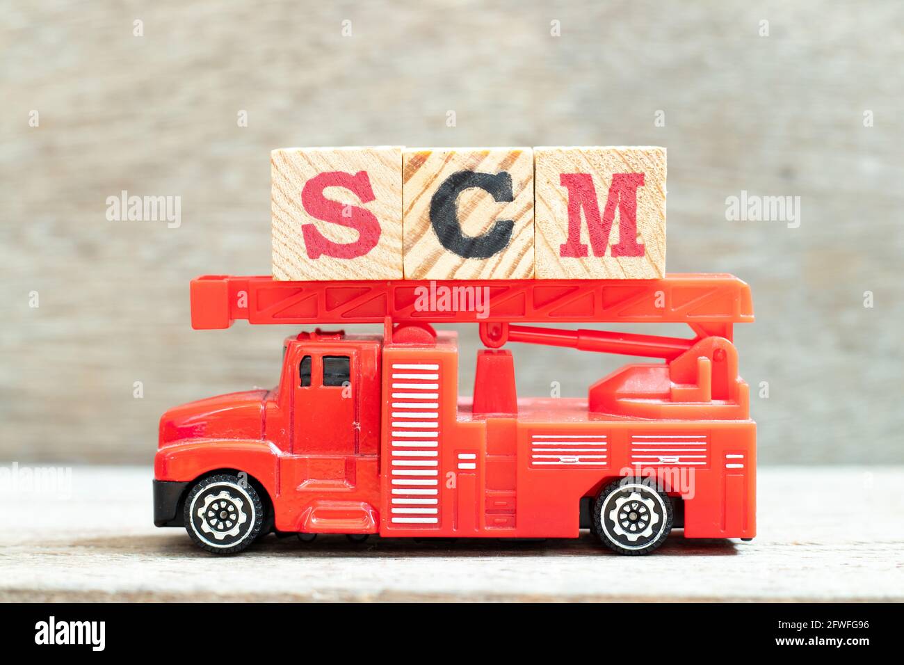 Fire ladder truck hold letter block in word SCM (Abbreviation of Supply ...