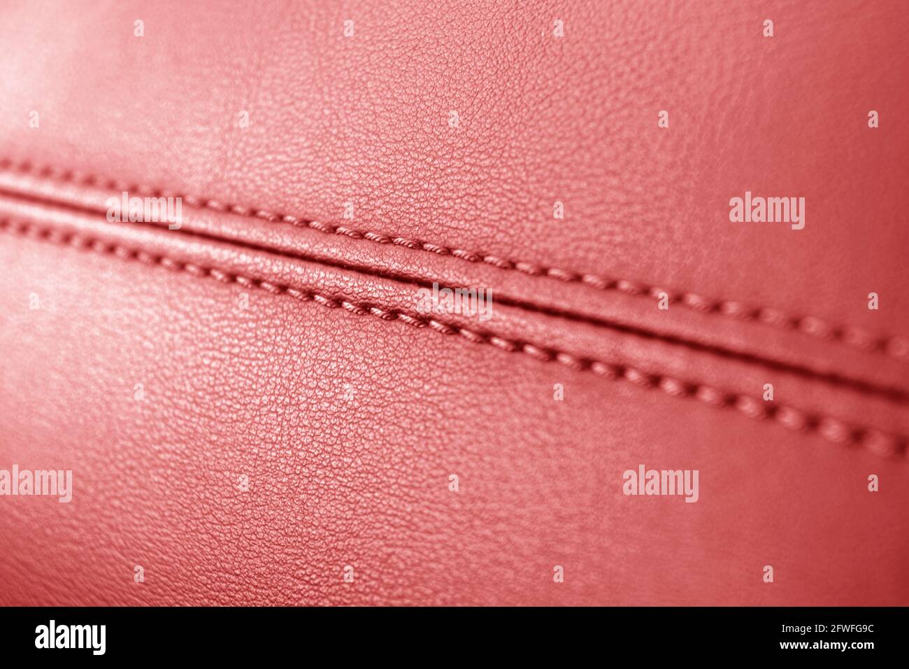 Modern luxury car red leather interior. Part of perforated leather car ...