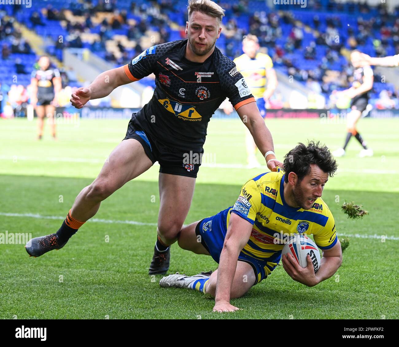 Stefan Ratchford (1) of Warrington Wolves gathers the ball in his own ...