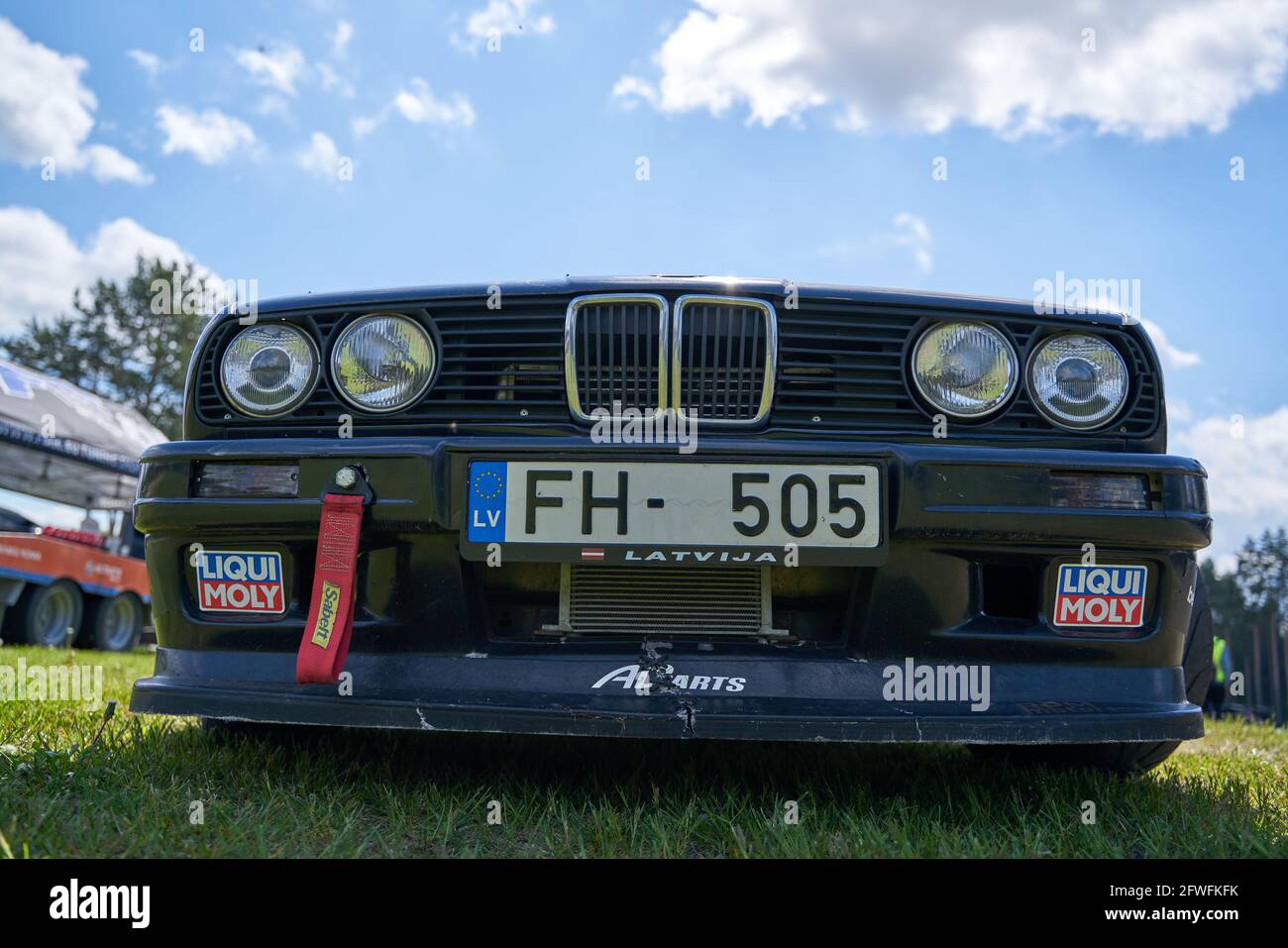 Round headlight on a old BMW car. Front view Stock Photo - Alamy