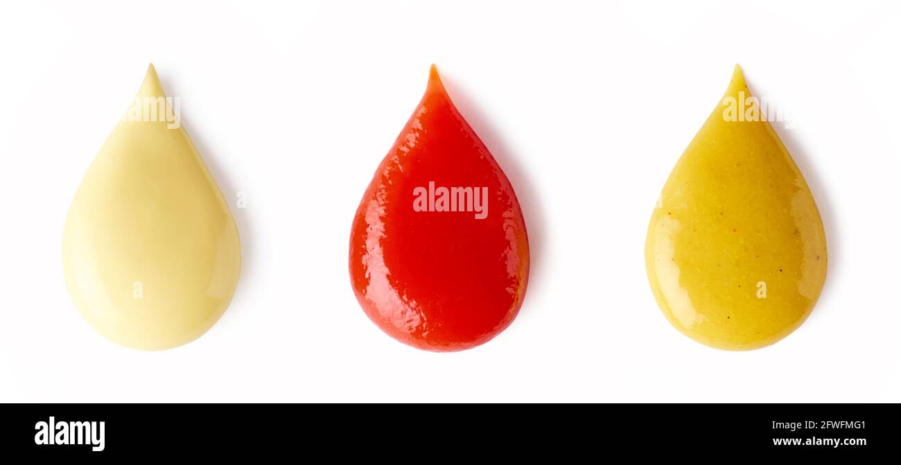 Drops of ketchup mayonnaise and mustard isolated on white background ...