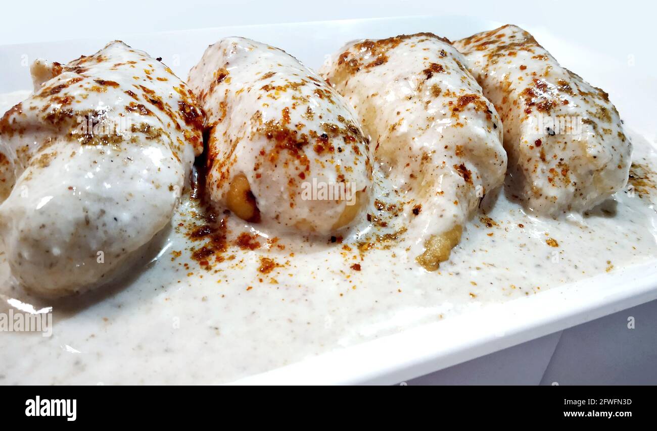Dahi vada or bhalla is a type of chaat originating from the Indian and ...