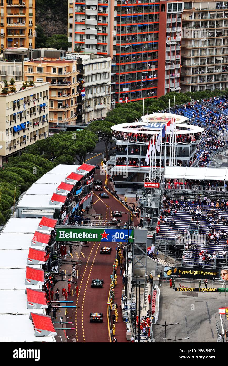 Lando Norris (GBR) McLaren MCL35M follows other cars out of the pits ...