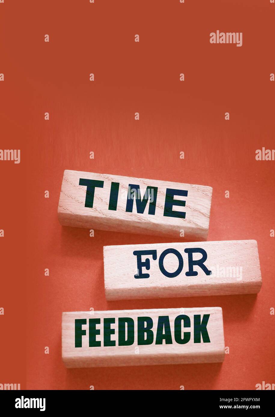Time fir feedback text on wooden blocks. Product or service evaluation ...
