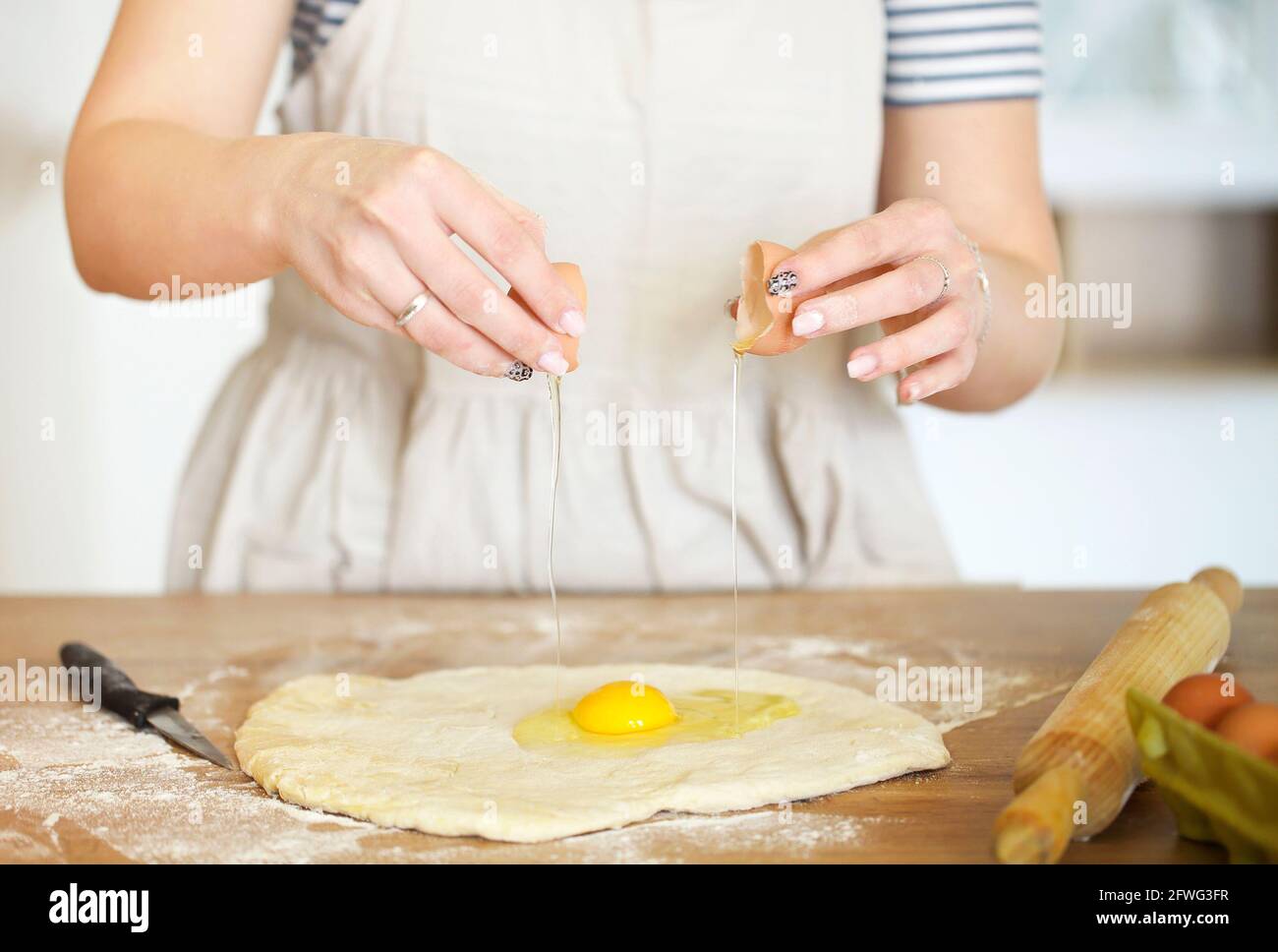Breaking egg hi-res stock photography and images - Alamy