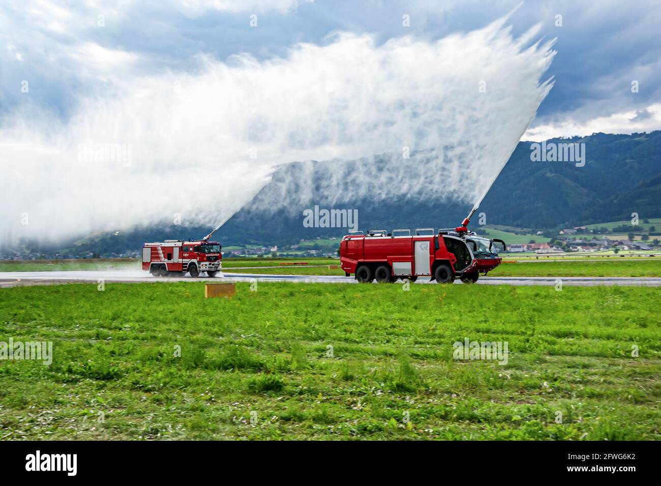 Zeltweg, Austria - June 29, 2013: Fire fighting with water spray. Fire ...