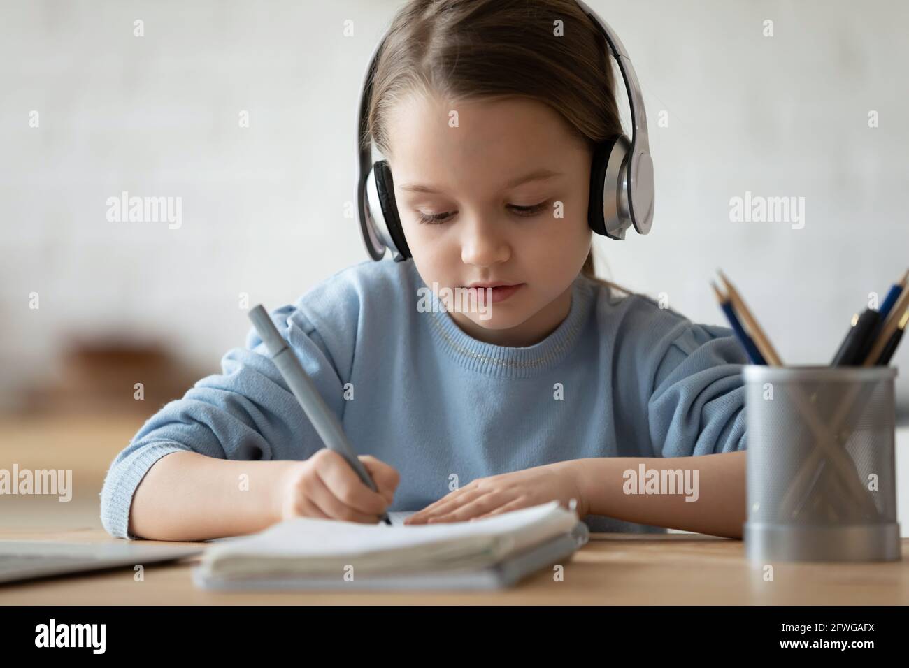Smart little girl child study at home Stock Photo - Alamy