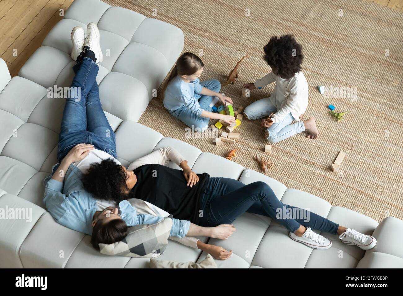 Top view of happy multiracial family relax at home Stock Photo - Alamy