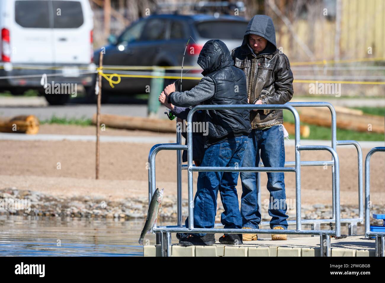 Two boys catching fish hi-res stock photography and images - Alamy