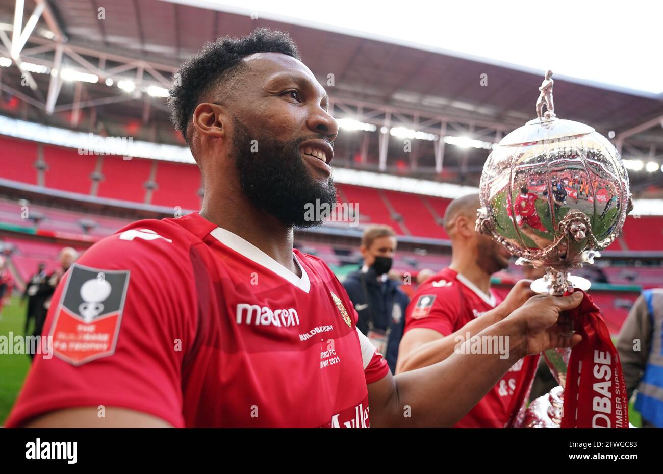 Hornchurh's Rickie Hayes celebrates with the trophy after the Buildbase ...