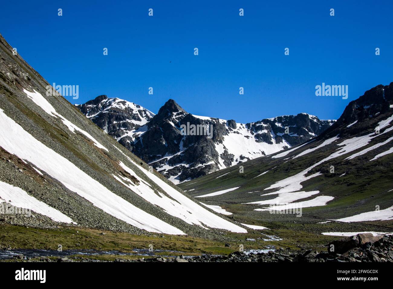 Spectacular views of the snowy mountains and valley, showing the ...