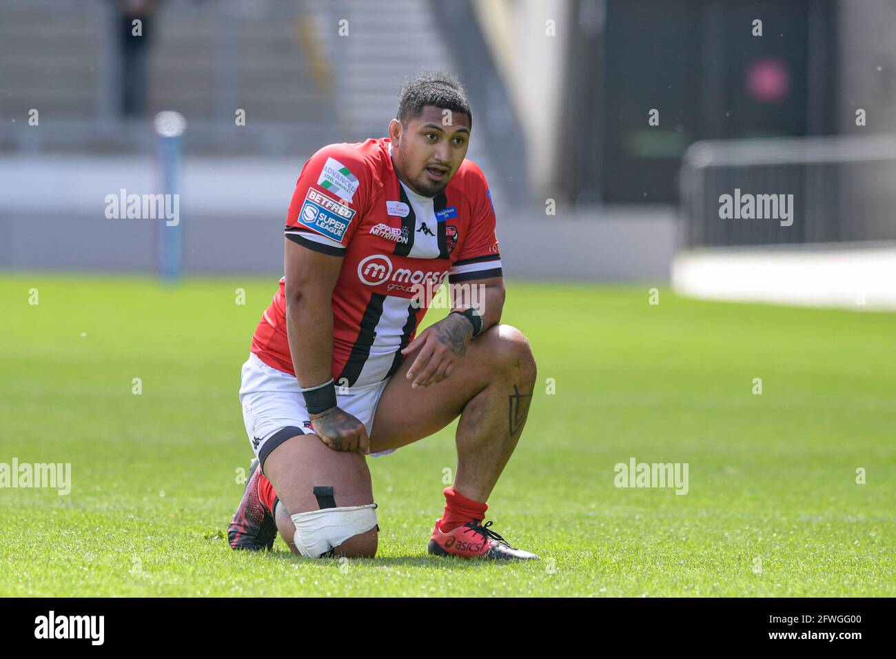 Pauli Pauli (12) of Salford Red Devils takes a breather during the game ...