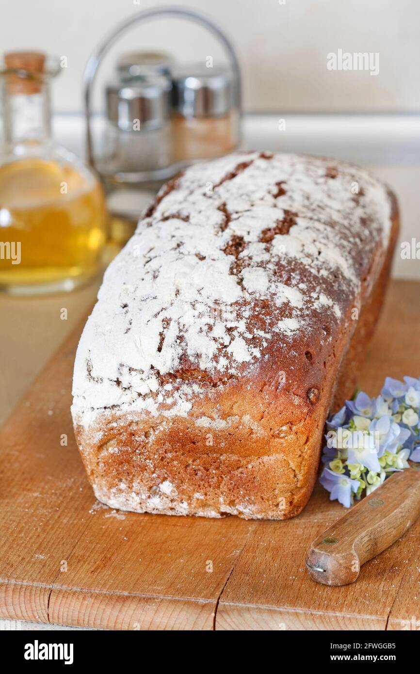 Loaf of brad in the kitchen. Breakfast time Stock Photo - Alamy