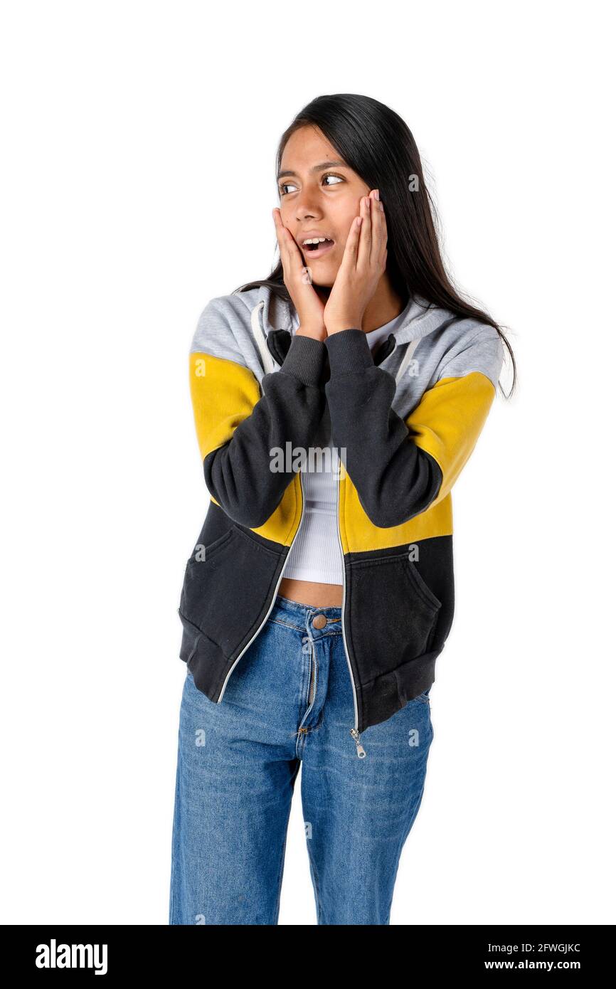 Attractive Latin woman holding her face with a lame expression on a ...