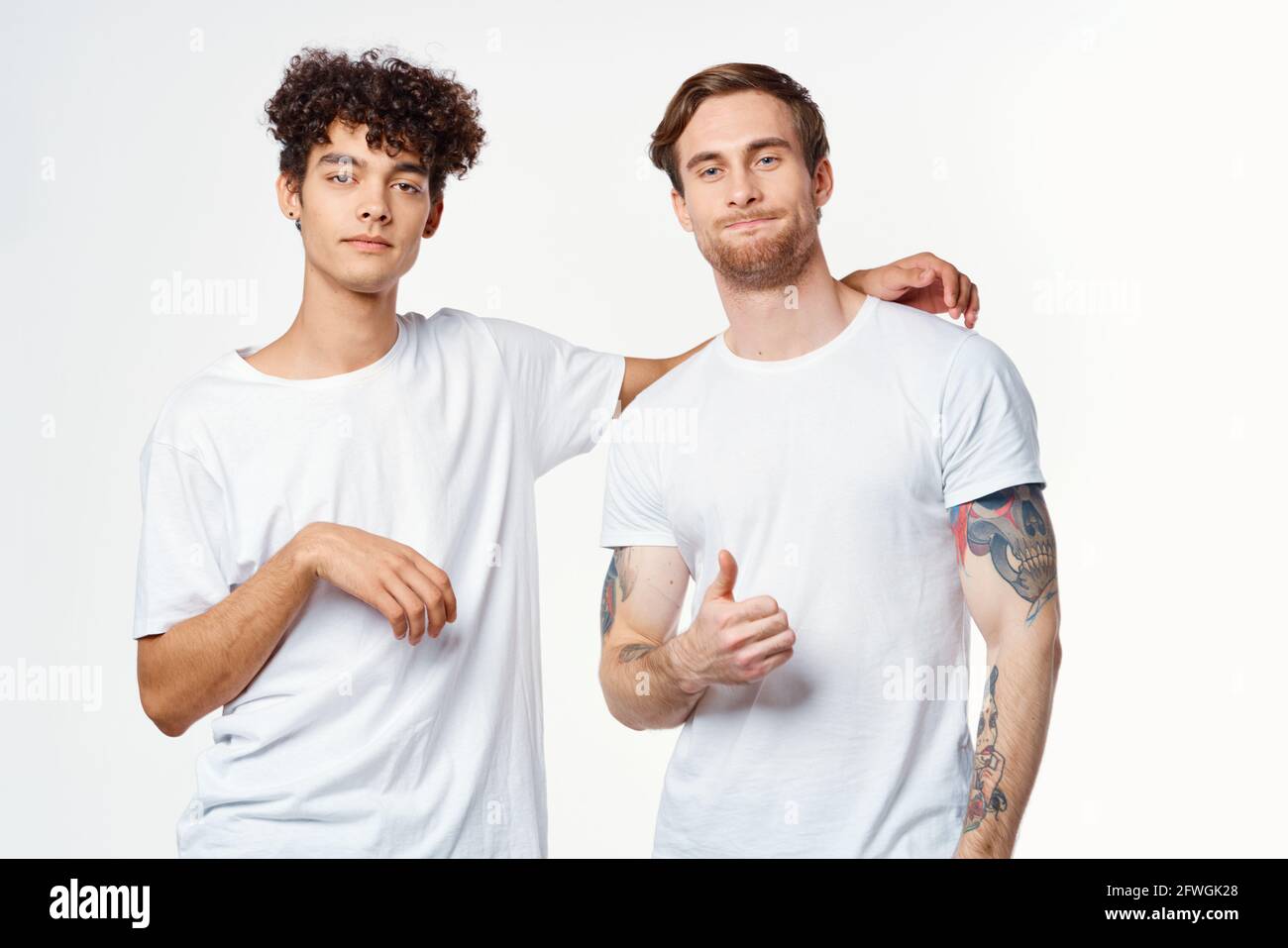two guys in white t-shirts next to friendship communication emotions ...