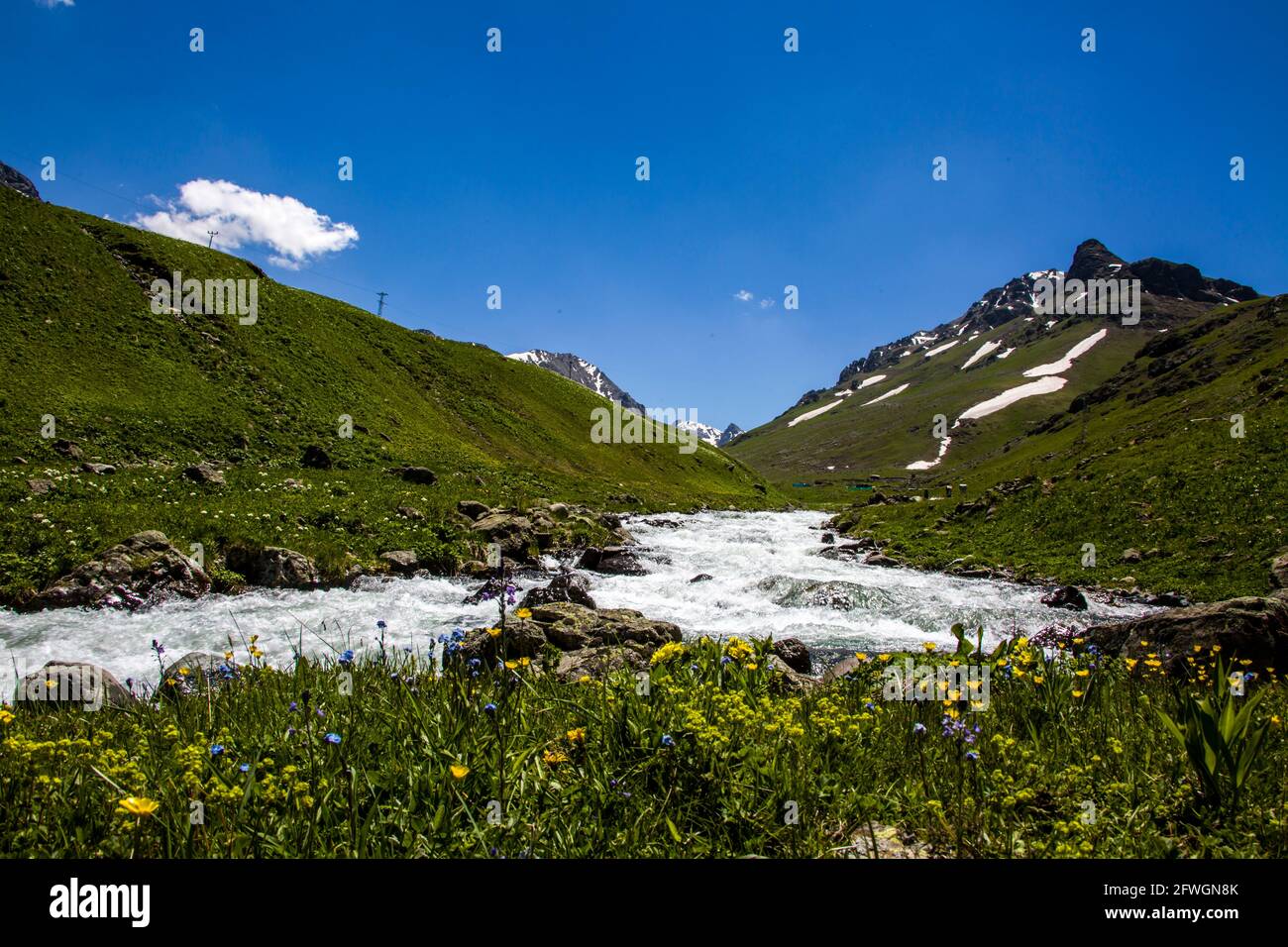 Spectacular views of the snowy mountains and valley, showing the ...