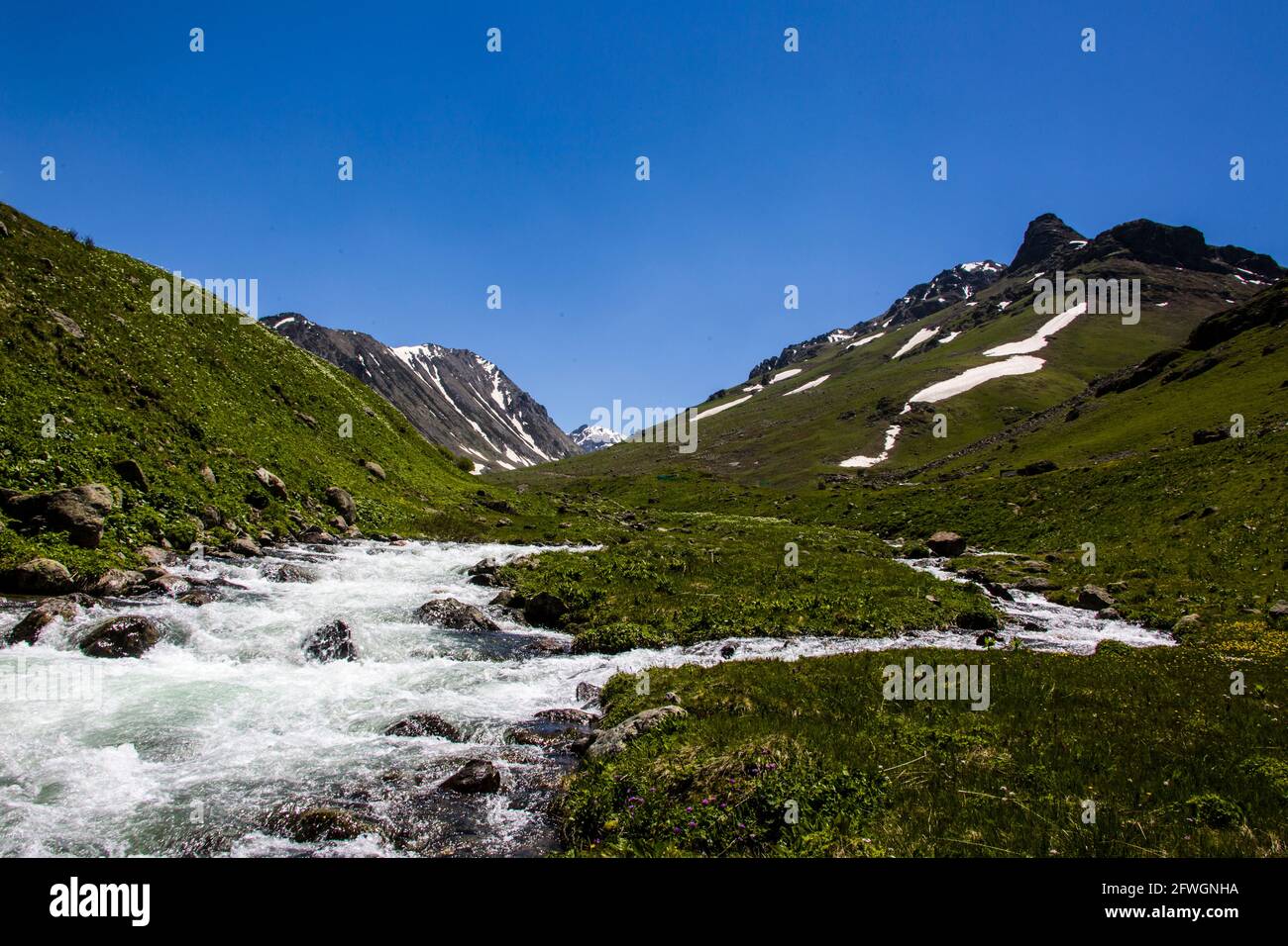 Spectacular views of the snowy mountains and valley, showing the ...