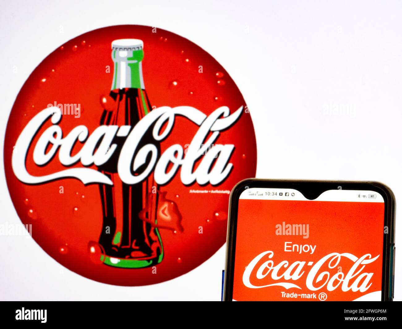 In this photo illustration, a Coca-Cola Company logo seen displayed on ...