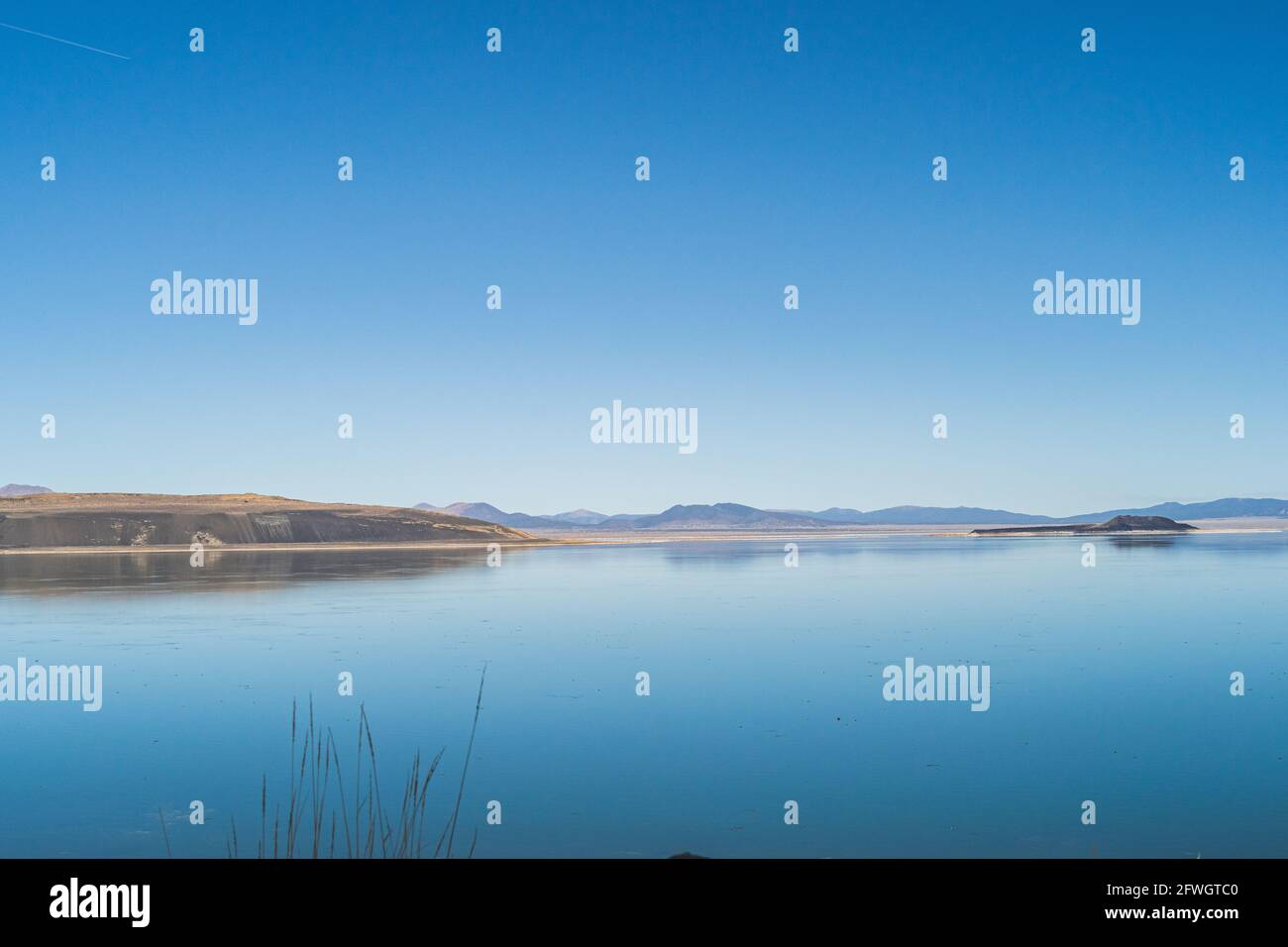 Mono lake, California in Autumn on sunny day with clear blue sky and ...