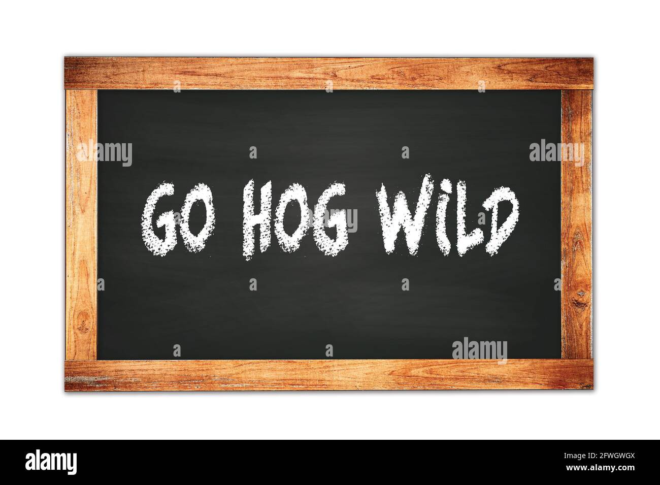 GO HOG WILD text written on black wooden frame school blackboard Stock ...