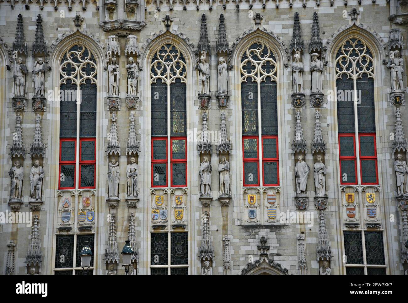 Scenic facade view with golden sculptures and stone engravings of the ...