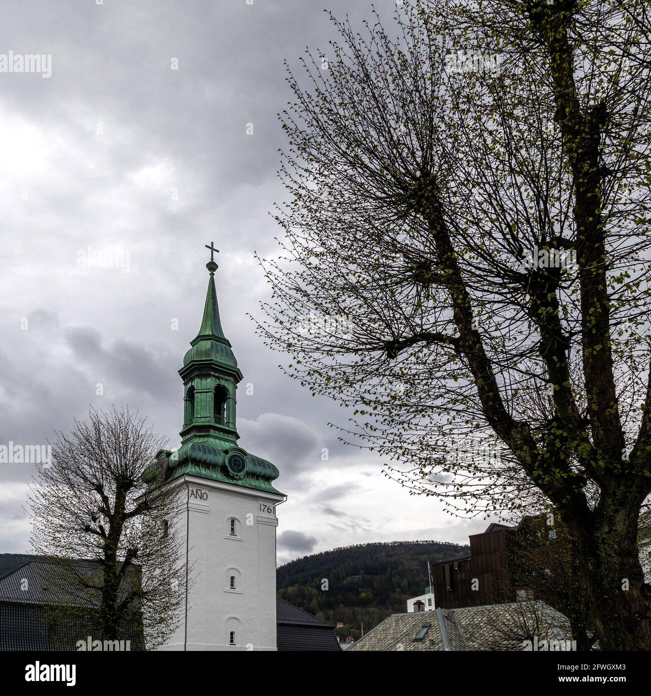 Nykirken white stone parish church in the port area of Nordnes in ...