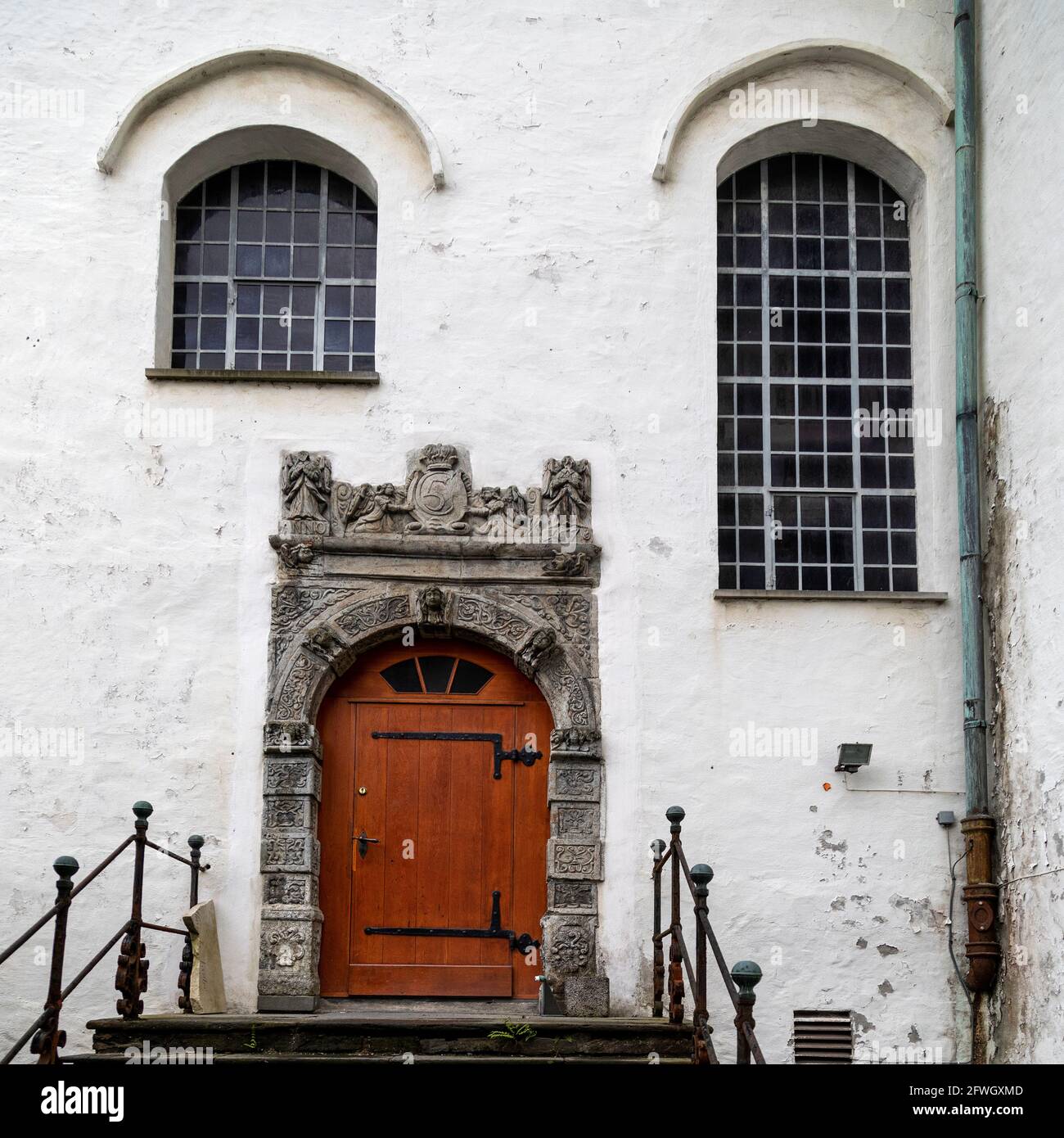 The back door Nykirken white stone parish church in the port area of ...