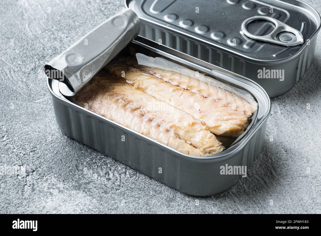 Canned Mackerel Fillets in Tin set, in tin can, on gray background ...