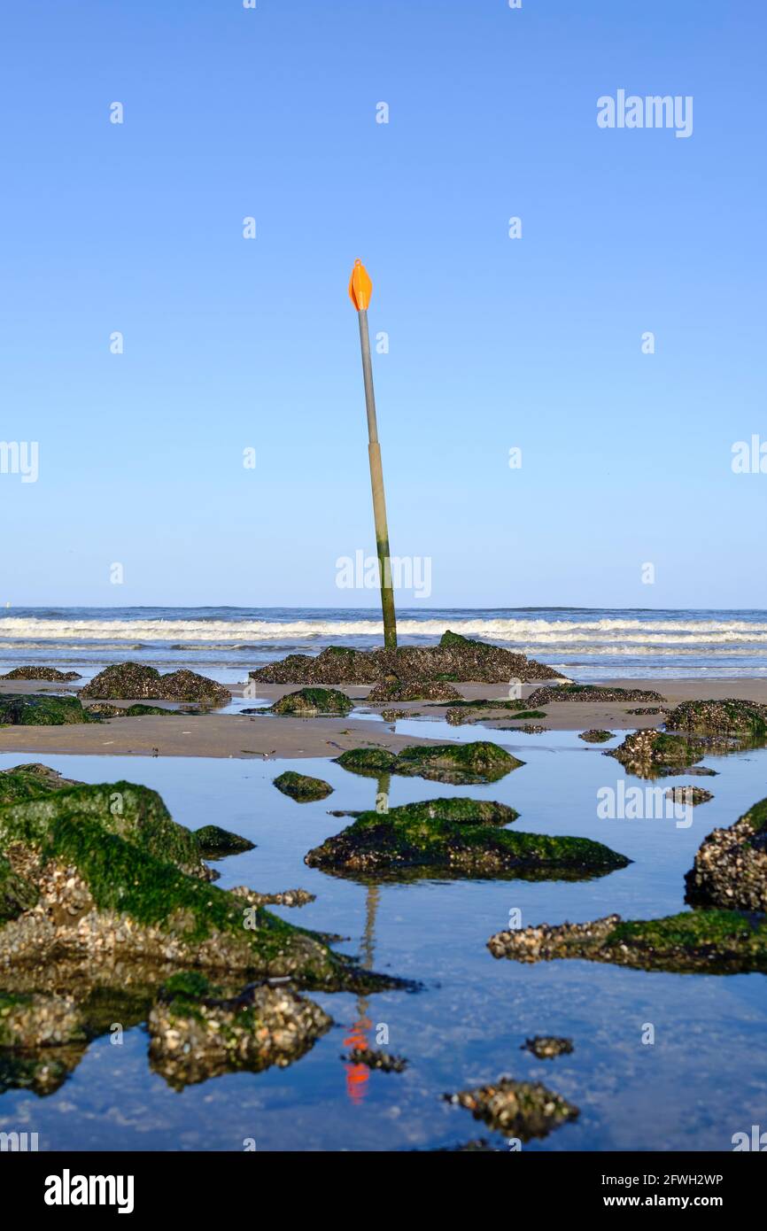 Warning sign on breakwater at South beach in The Hague, Netherlands ...
