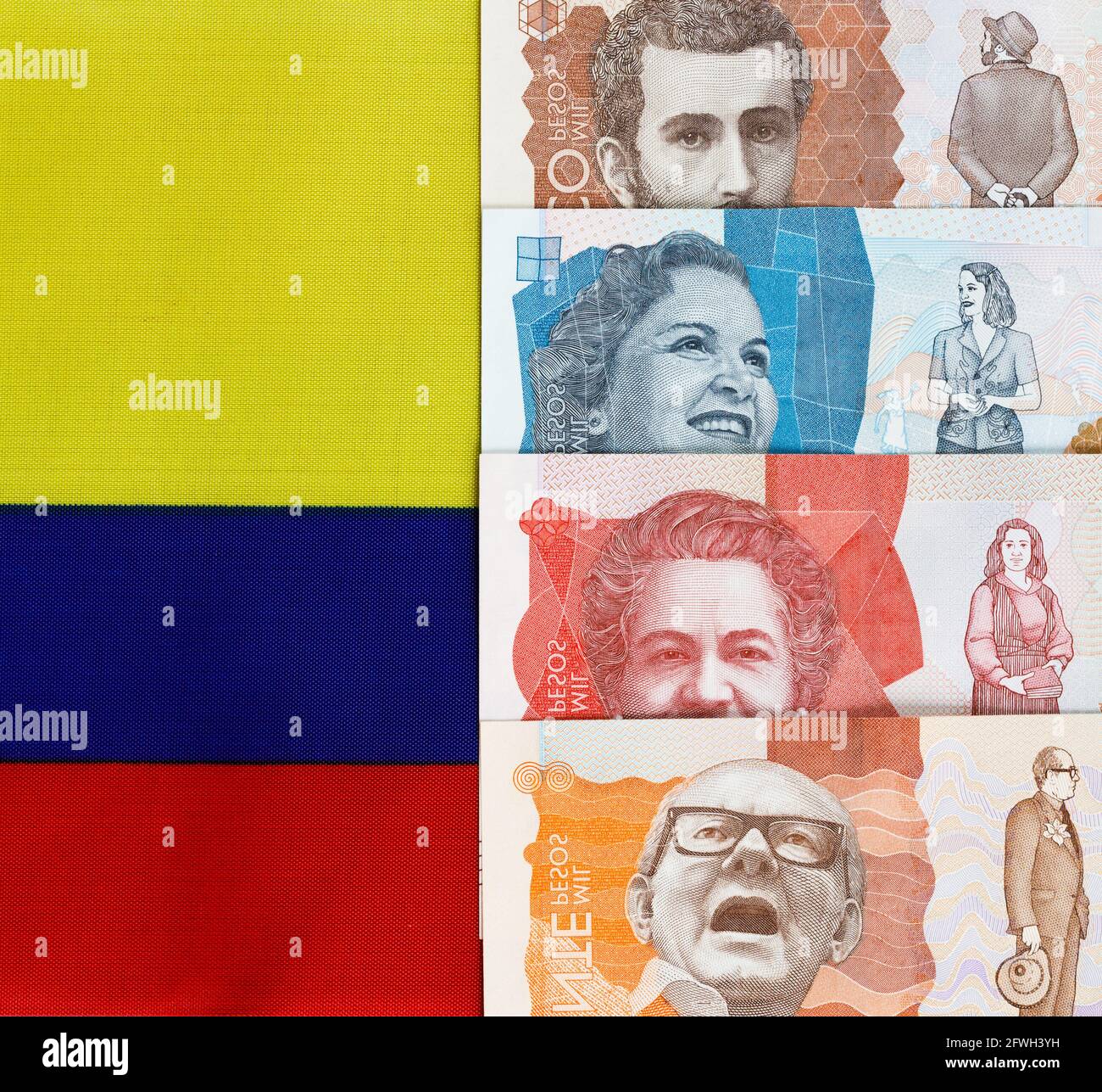 Colombian money, pesos, against the background of the colors of the ...