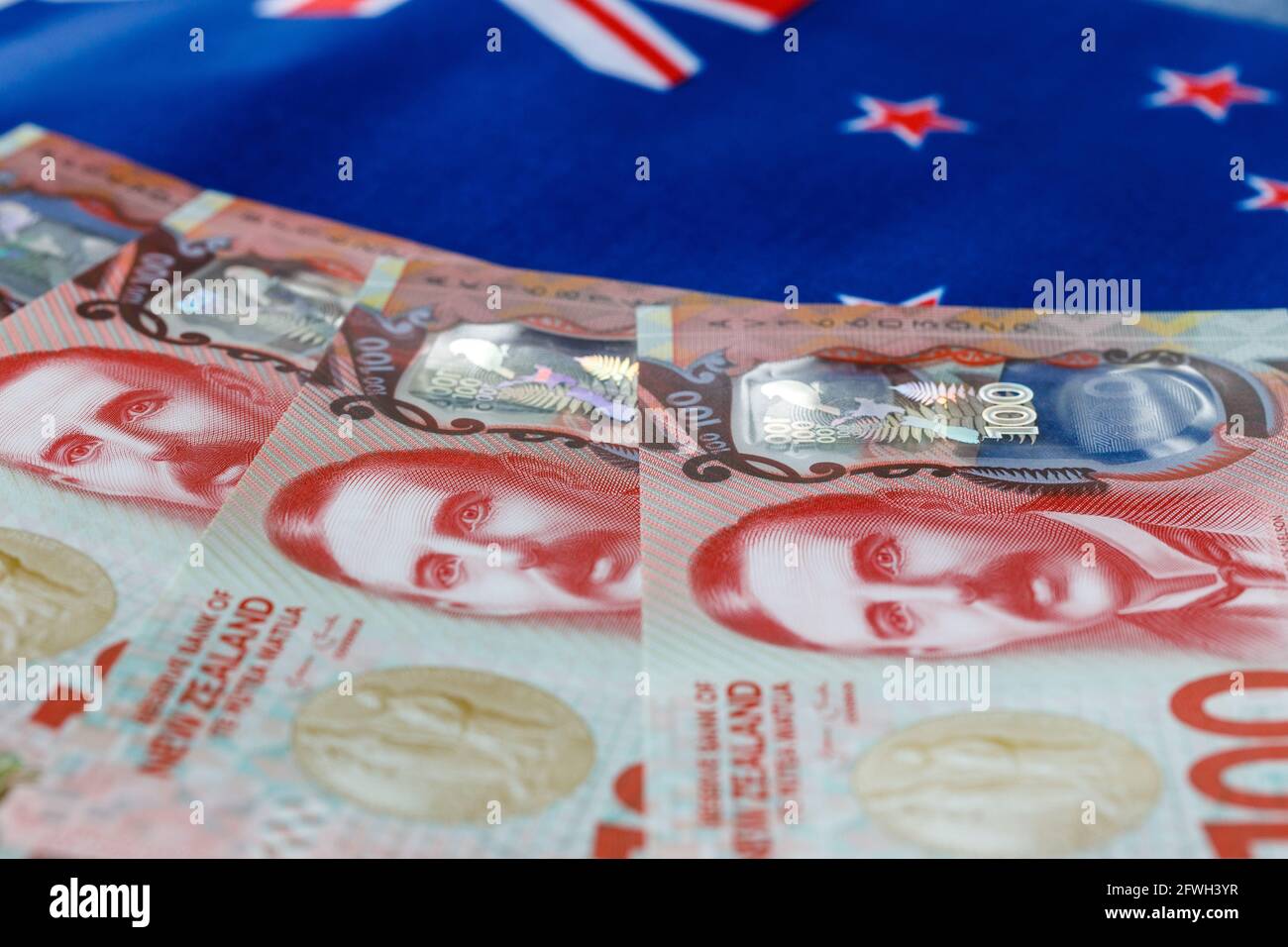 New Zealand money on the background of the colors of the national flag ...