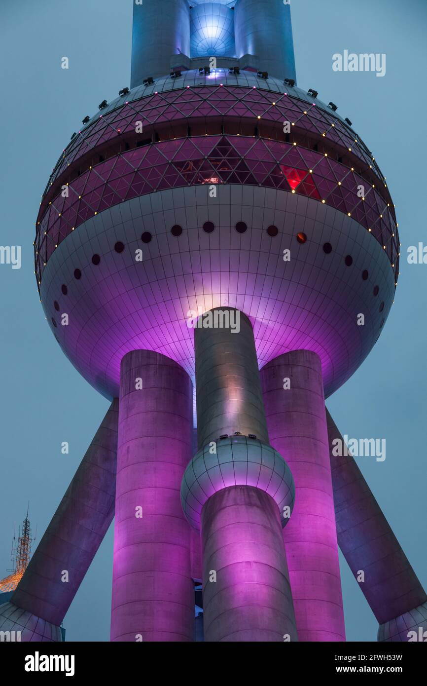 Detail of the Oriental Pearl TV Tower, illuminated in purple lighting ...