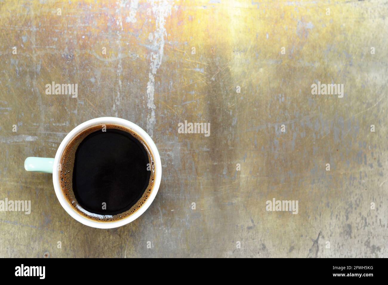 Cup of coffee on rusty background with copy space Stock Photo - Alamy