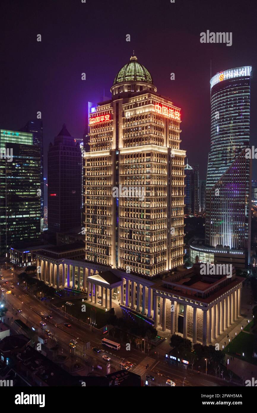 The illuminated China Ping'An Finance Building in Pudong, Shanghai, PRC ...