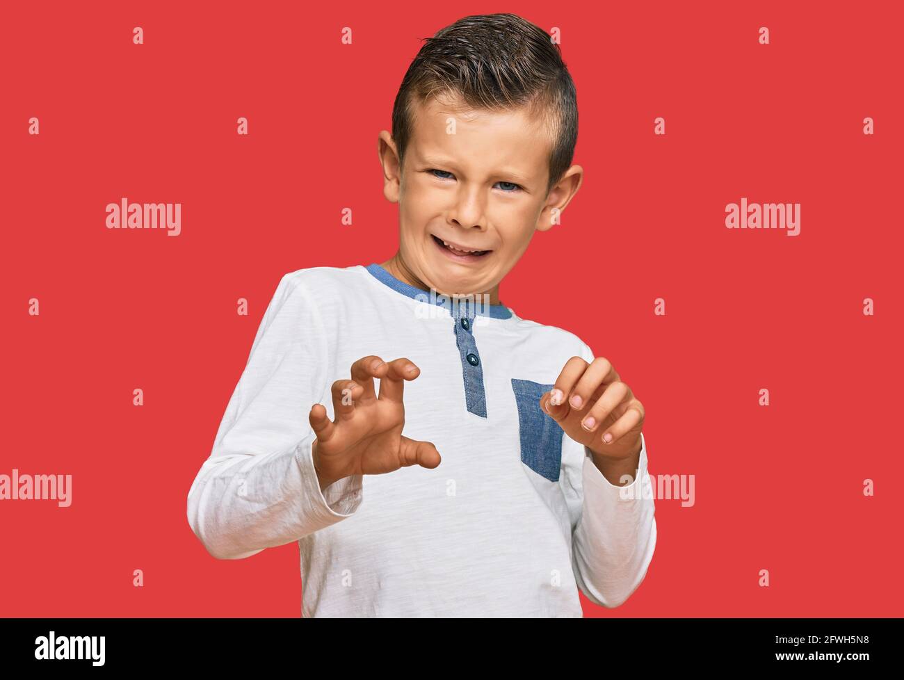 Adorable caucasian kid wearing casual clothes disgusted expression ...