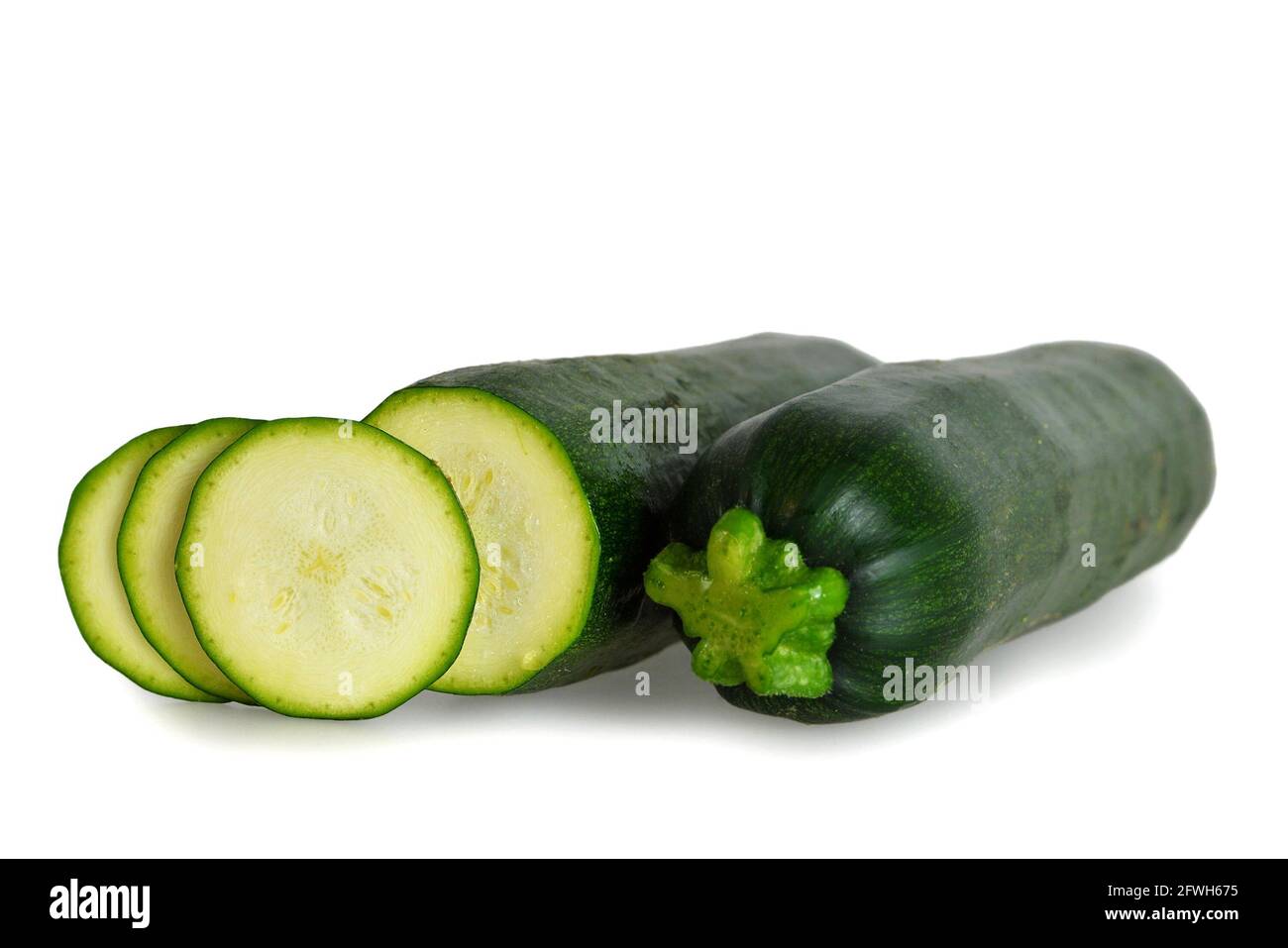 Zucchini isolated on white background Stock Photo - Alamy