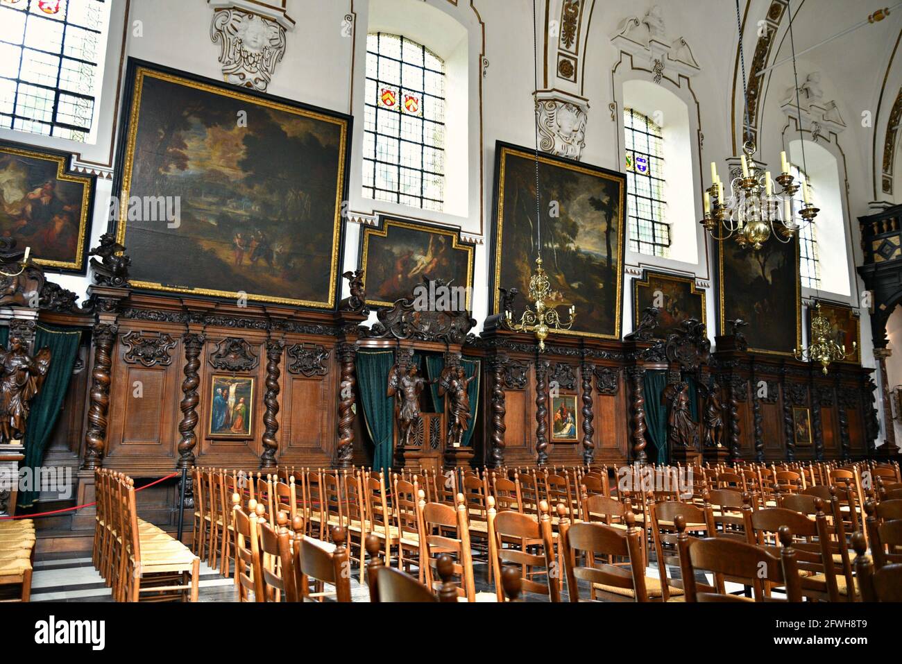 Baroque style interior view with religious paintings of Sint-Annakerk a ...