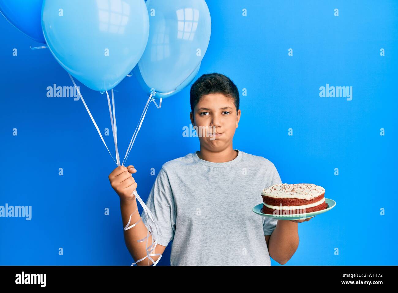 Mouth blowing air into balloons hi-res stock photography and images - Alamy