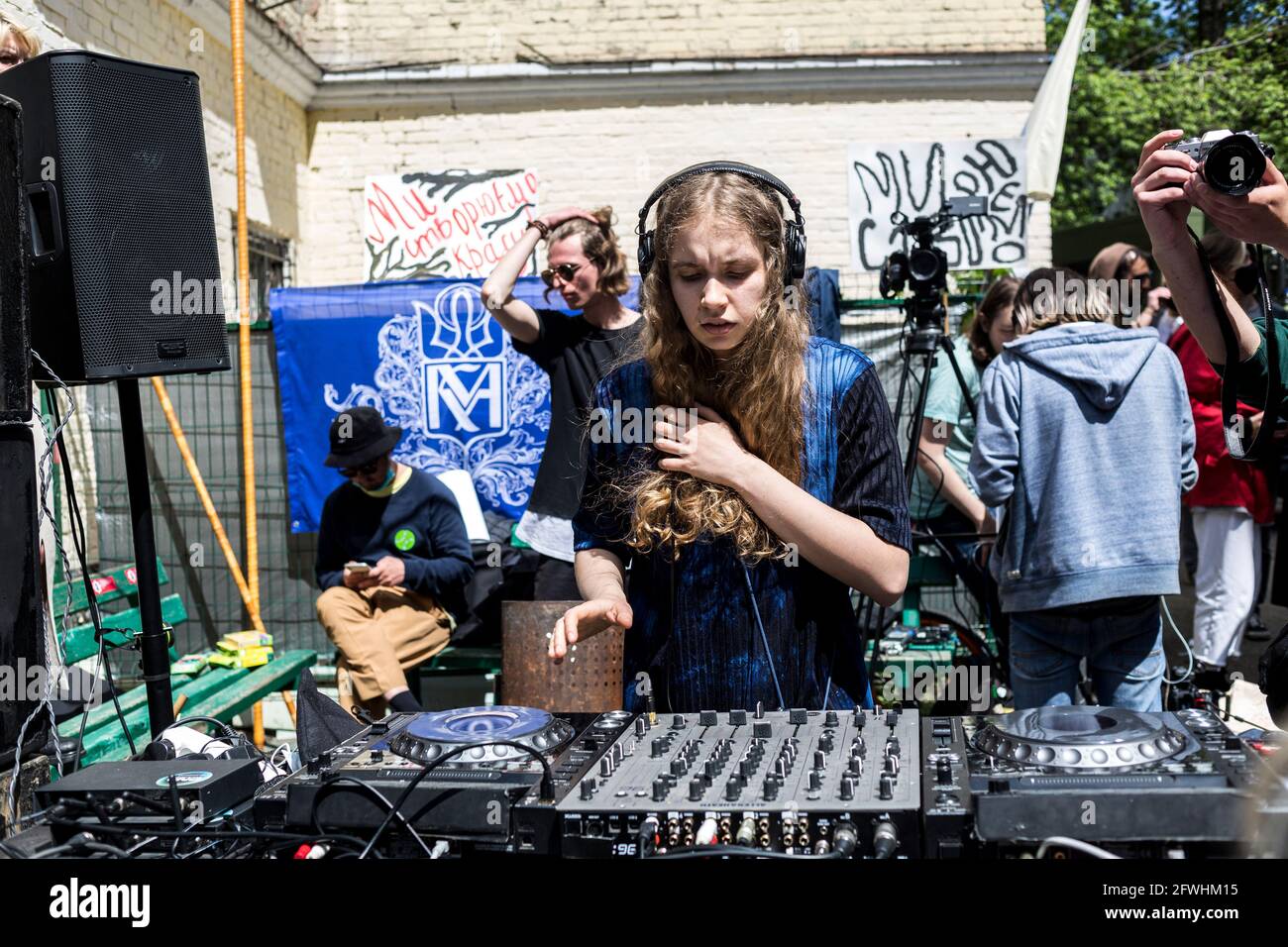 KYIV, UKRAINE - May 21 2021: DJ girl playing music on a protest action ...