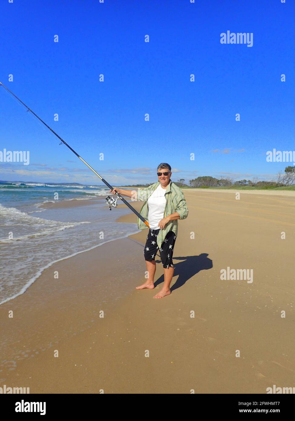 Surfcasting beach fishing hi-res stock photography and images - Alamy