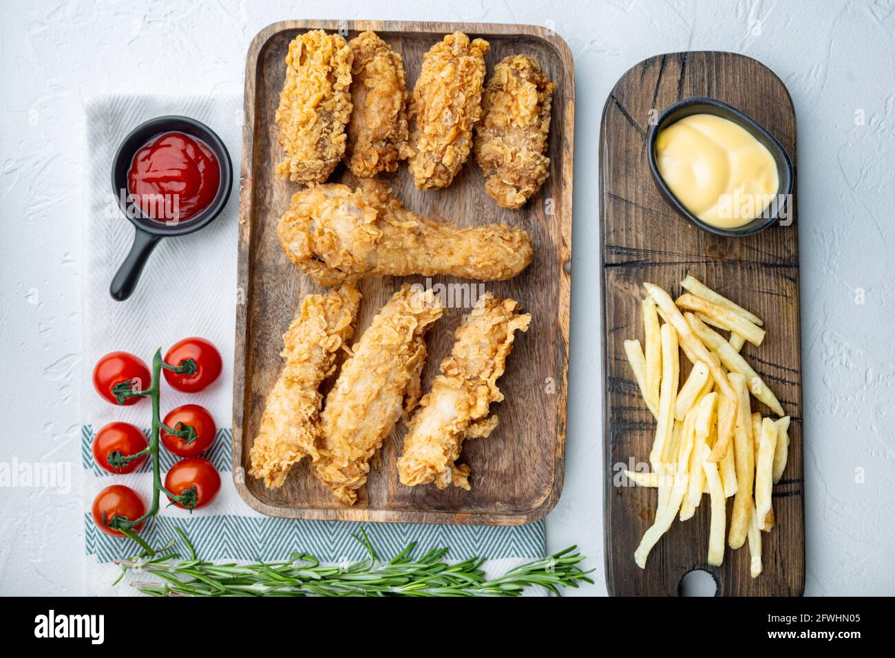 Crispy fried chicken parts on white background, flat lay Stock Photo ...
