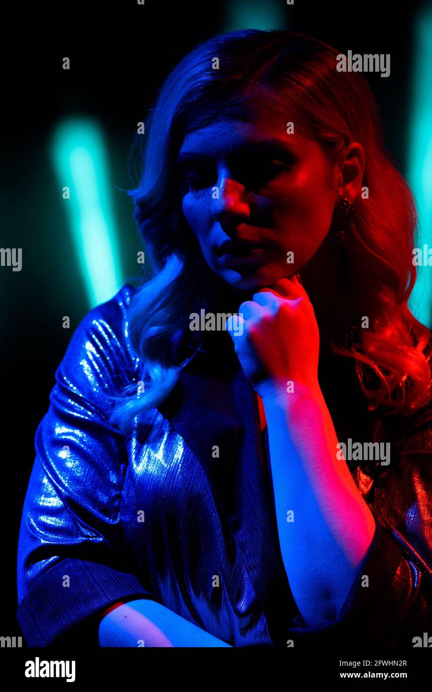Singer standing on the stage in the night club Stock Photo - Alamy