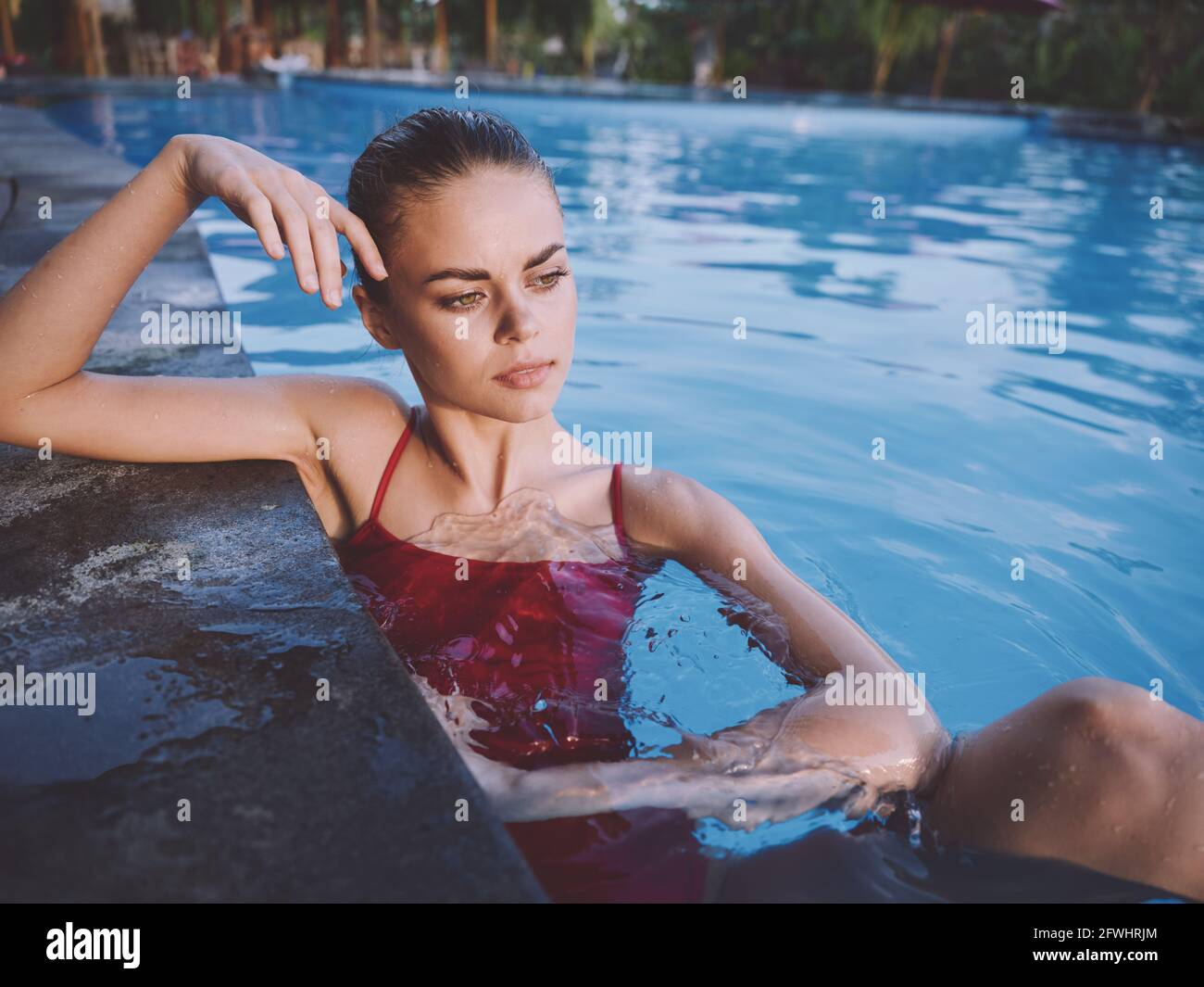 Woman relaxing in pool sunset bali hi-res stock photography and images ...