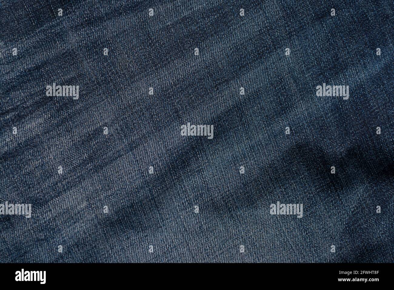 Blue dirty jeans, texture of crumpled fabric Stock Photo - Alamy