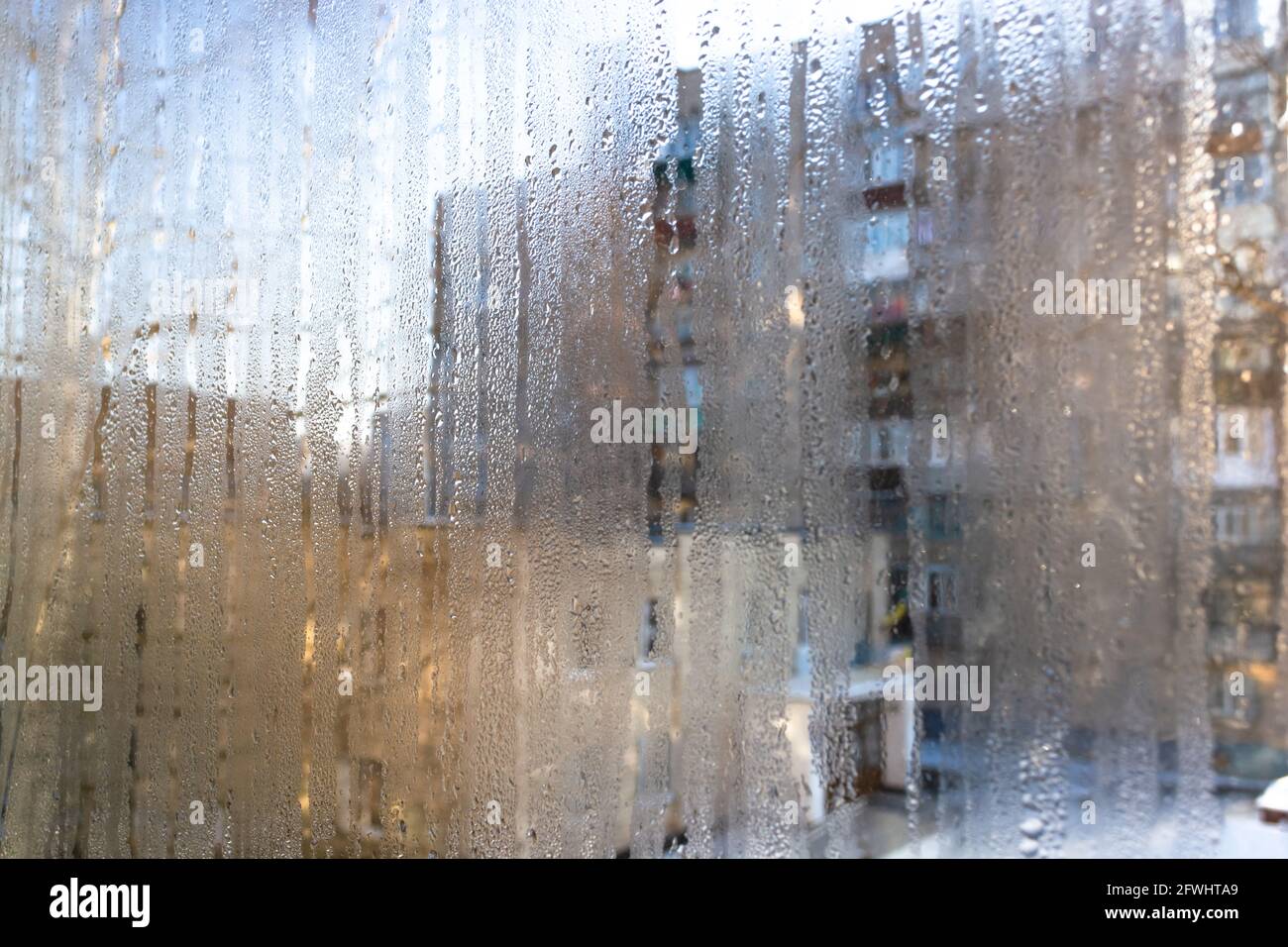 View of city houses through a fogged window Stock Photo - Alamy